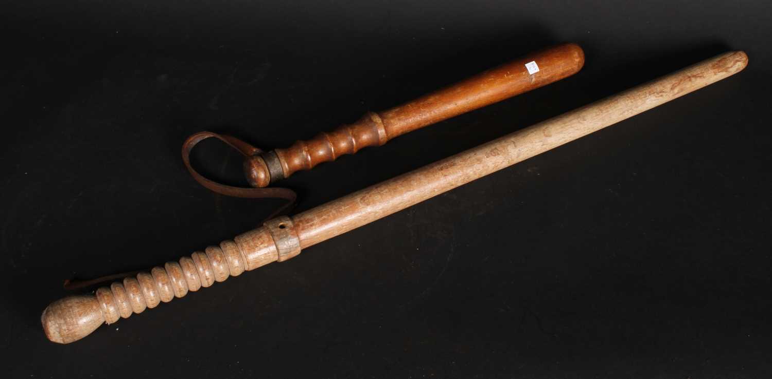 Lot 761 - A Shore Patrol oak night stick together with