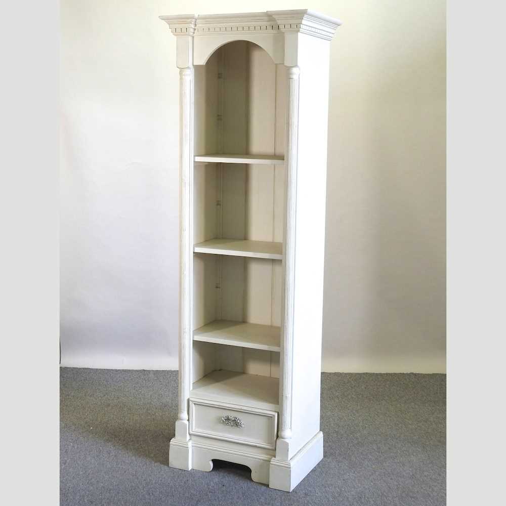 Lot 448 - A modern cream painted narrow standing open