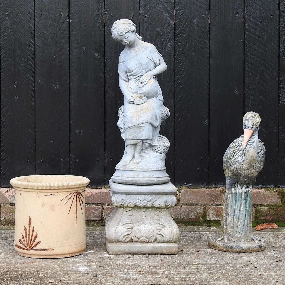 Lot 365 - A cast stone garden statue