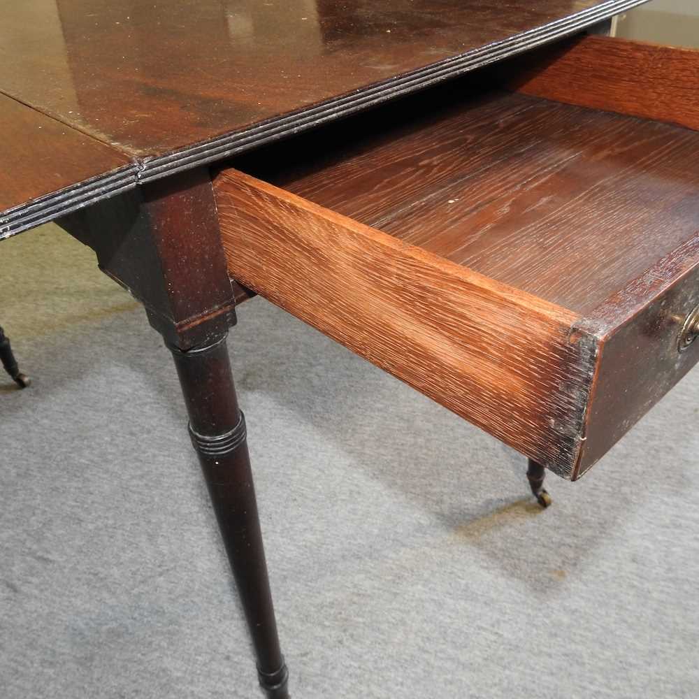 Lot 650 - A Regency mahogany pembroke table