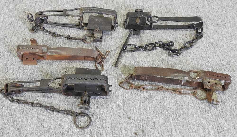 Lot 440 - A collection of nine 19th century iron gin