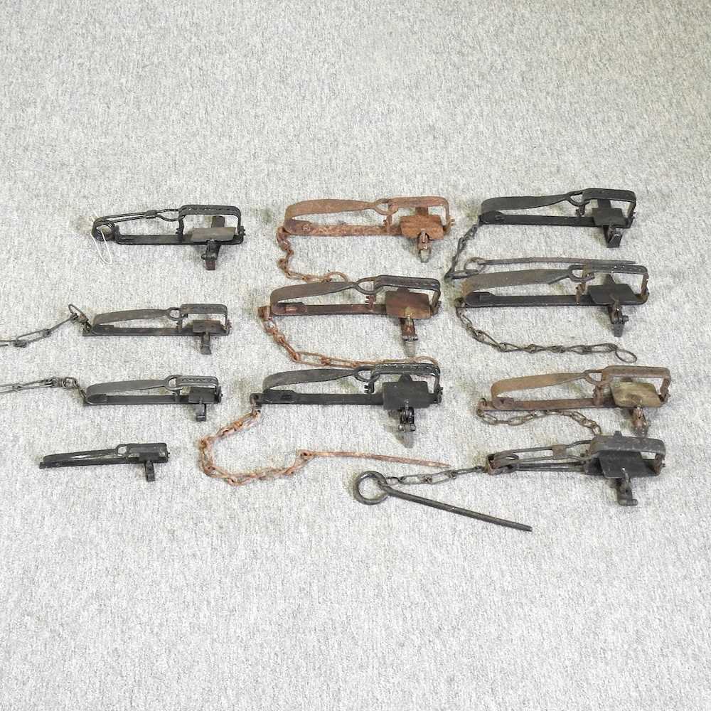 Lot 460 - A collection of eleven 19th century iron gin