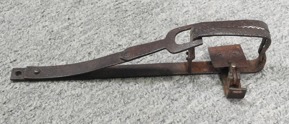 Lot 228 - A 19th century iron gin trap stamped H Lane