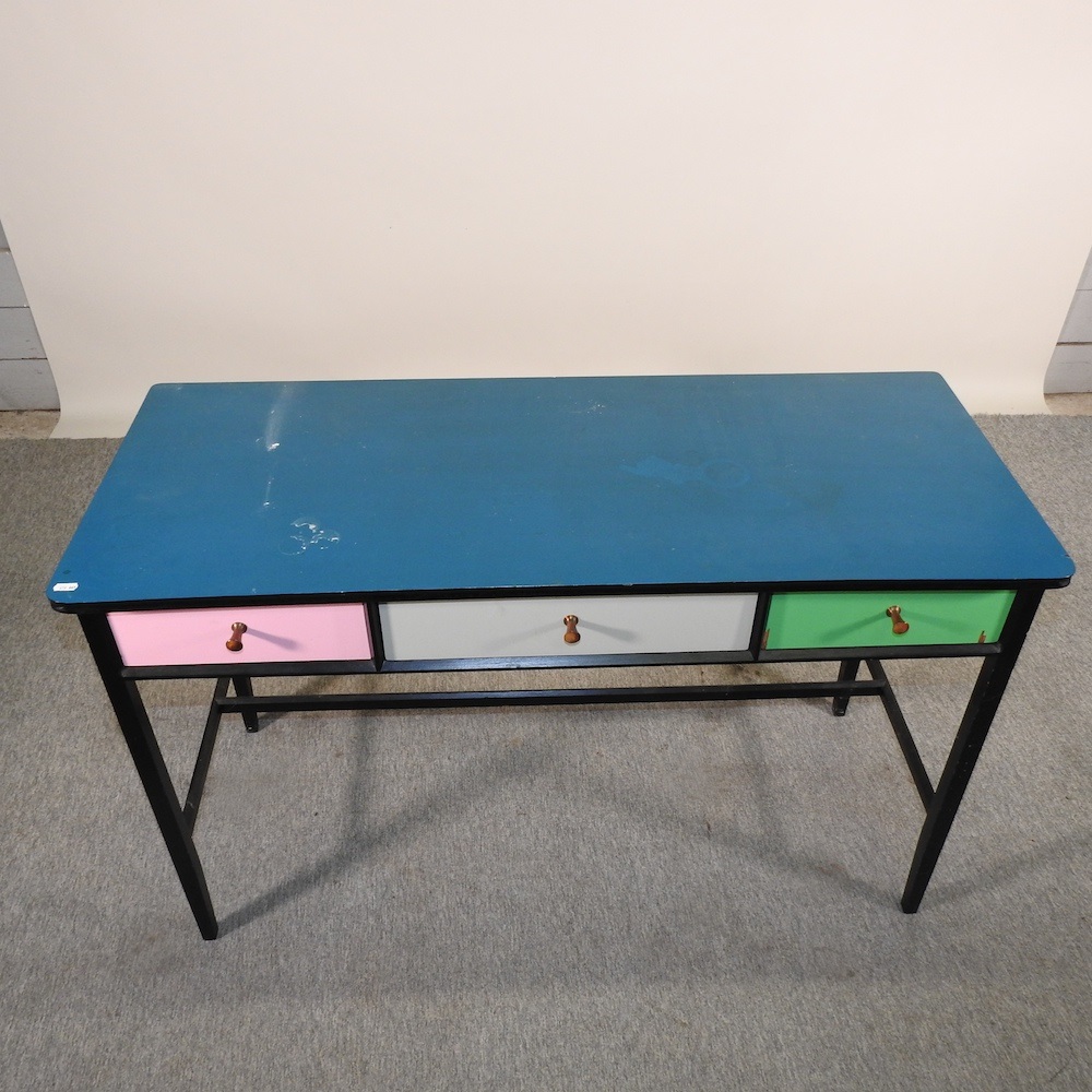 Lot 631 - A 1960's multi coloured side table