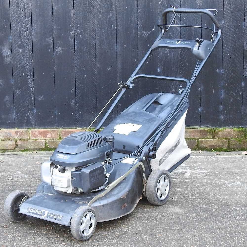 Lot 324 - A Champion lawnmower