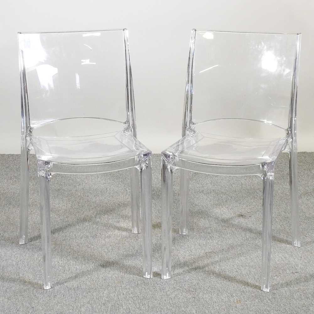 Lot 601 - A pair of perspex ghost chairs