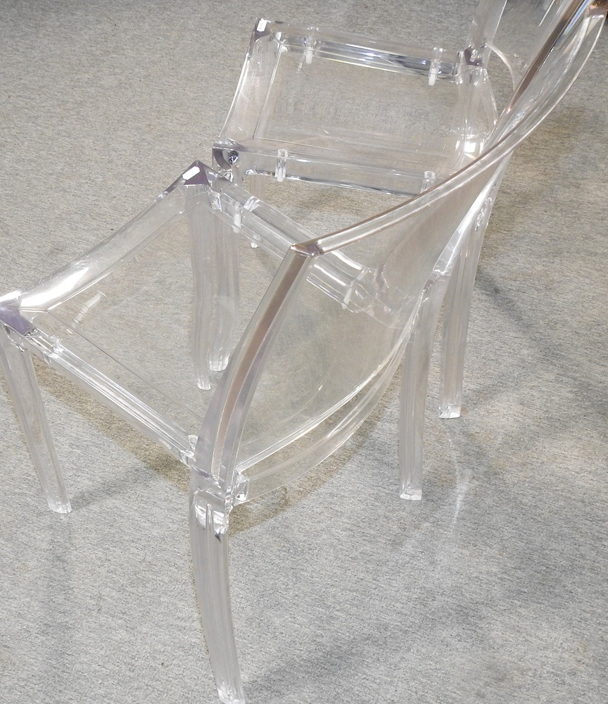 Lot 601 - A pair of perspex ghost chairs