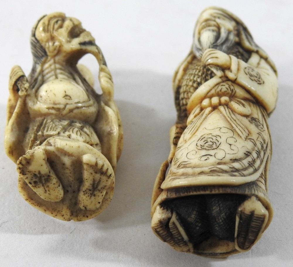 Lot 61 - Two Japanese carved bone netsuke