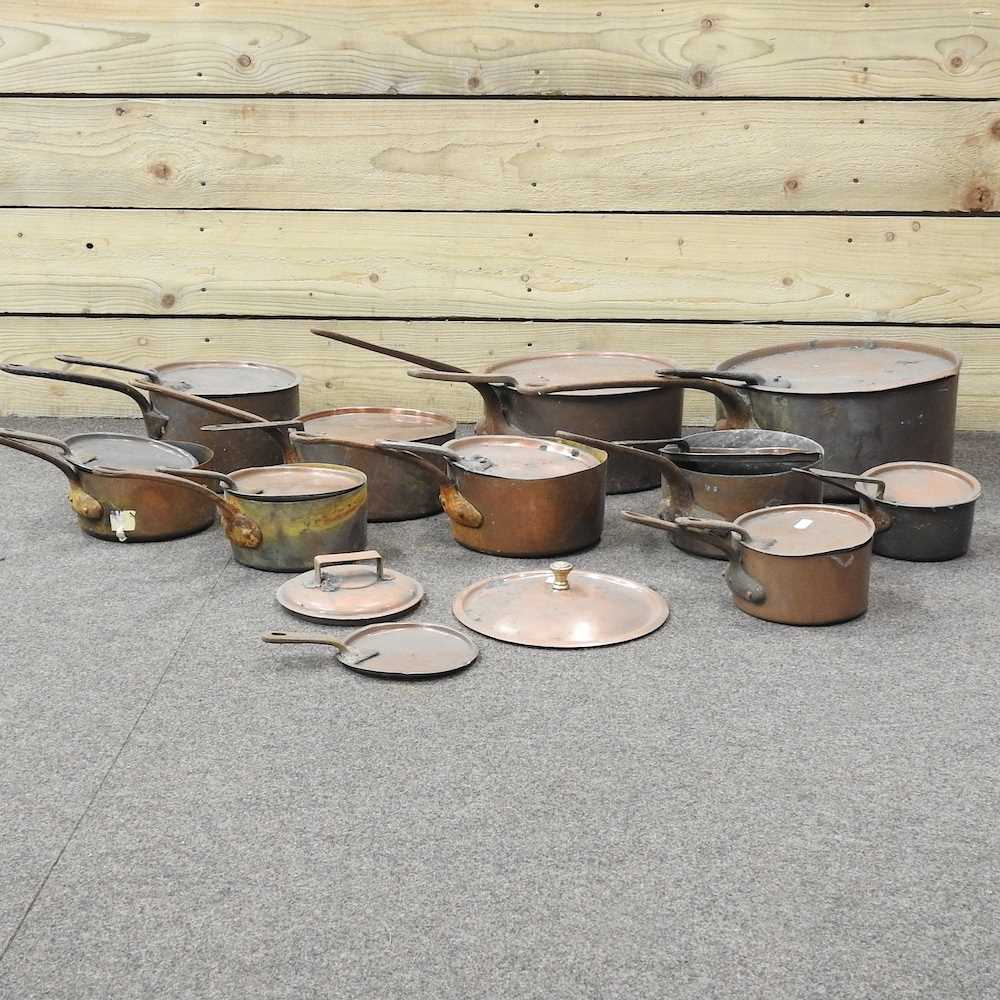 Lot 243 - A collection of antique copper pans