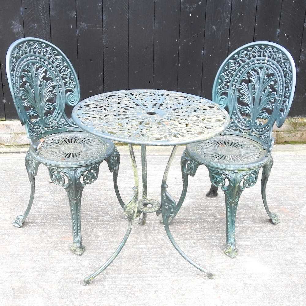 Lot 318 - A green painted metal garden table