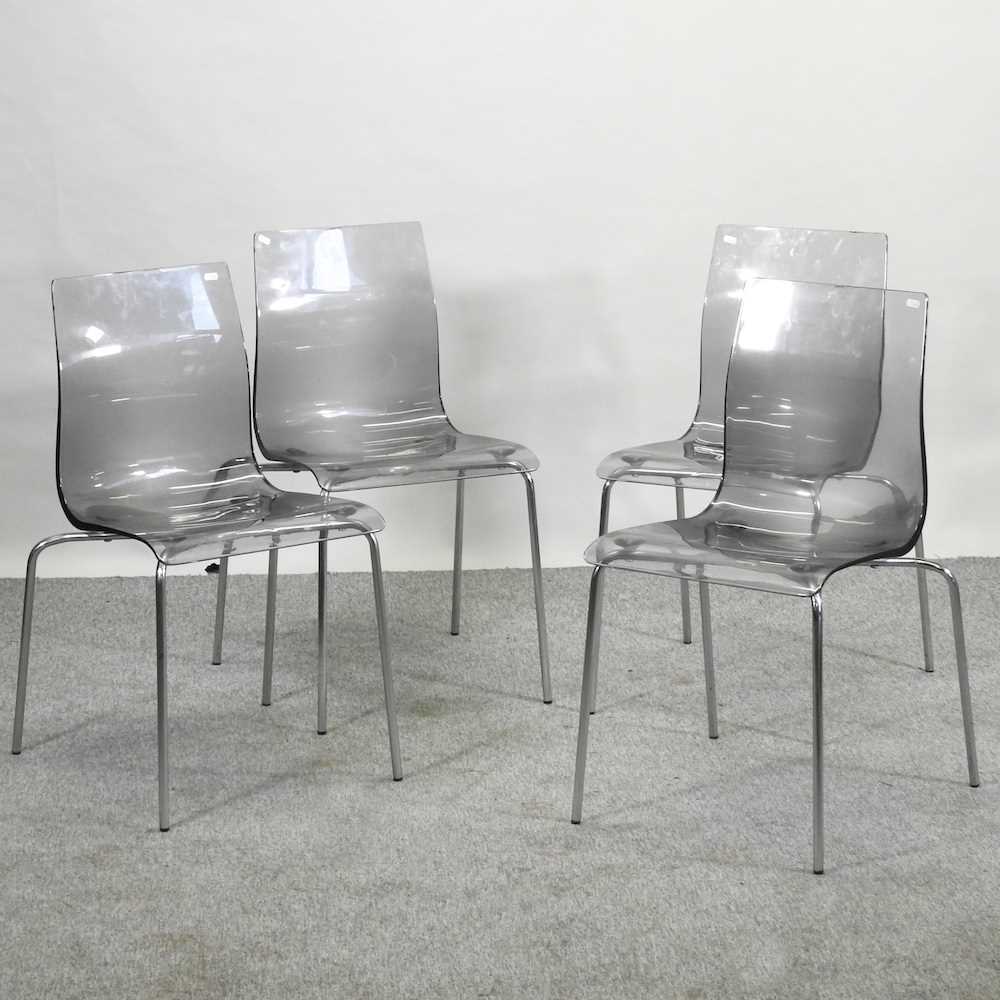 Lot 516 - A set of eight Italian perspex dining chairs