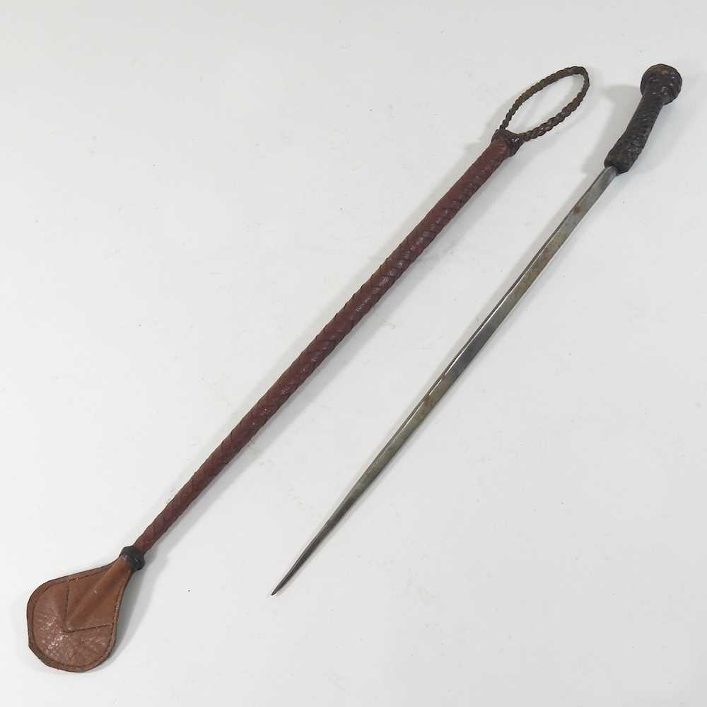 Lot 267 - A braided leather horse riding crop,