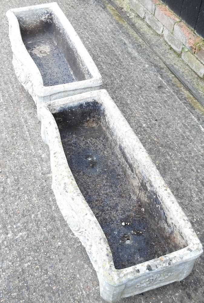 Lot 490 - A pair of cast stone garden troughs