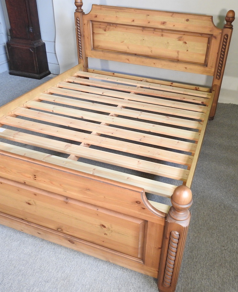 Lot 550 - A modern pine double bedstead