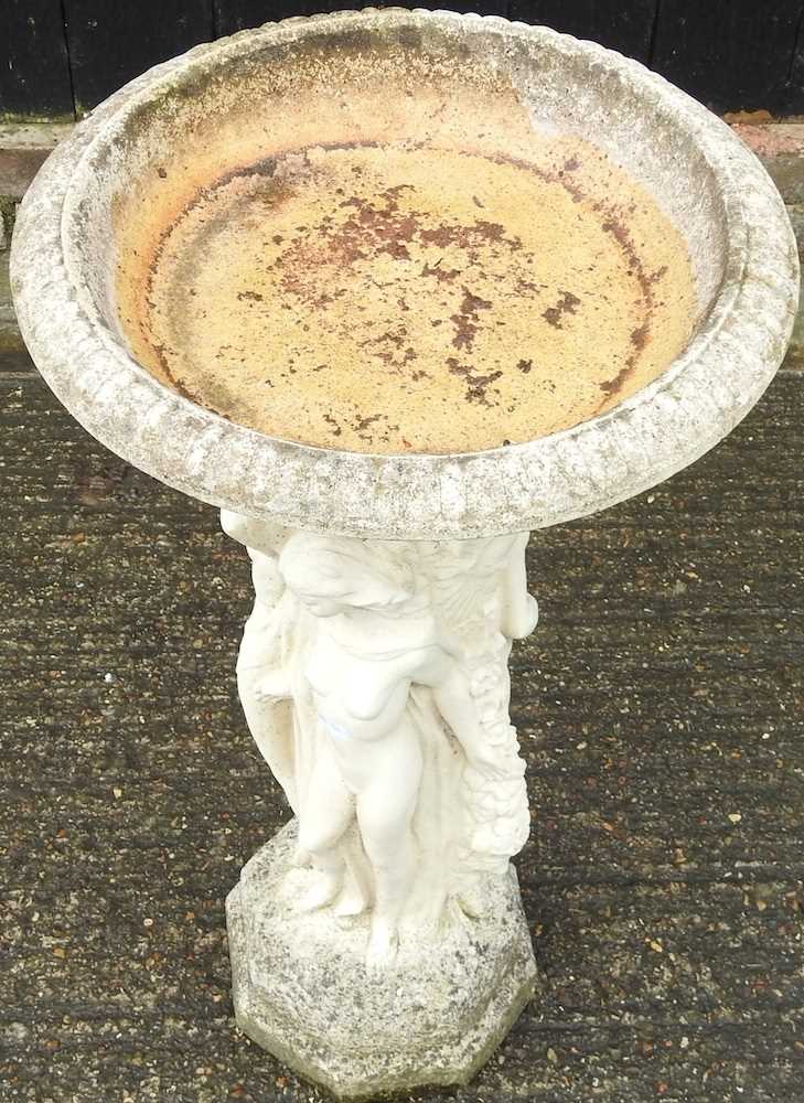 Lot 451 - A cast stone bird bath