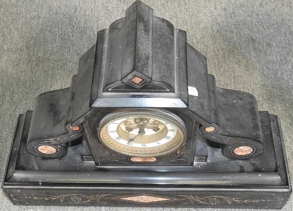 Lot 687 - A Victorian black slate clock garniture