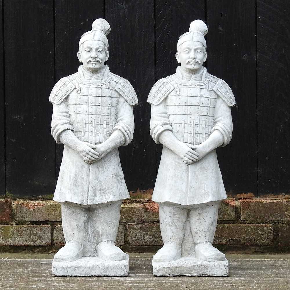 Lot 337 - A pair of cast stone figures