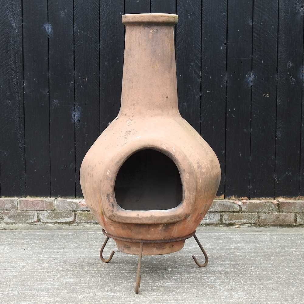 Lot 358 - A large terracotta chiminea