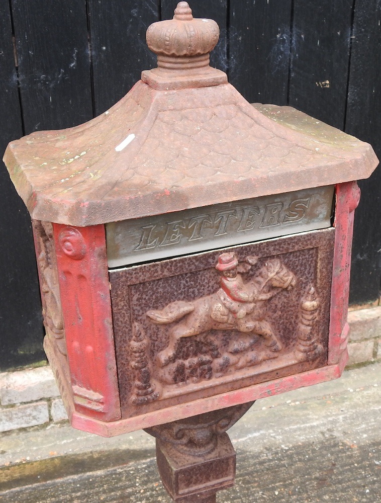 Lot 317 - A cast iron post box