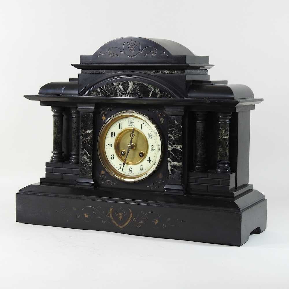 Lot 130 - A Victorian black slate mantel clock,