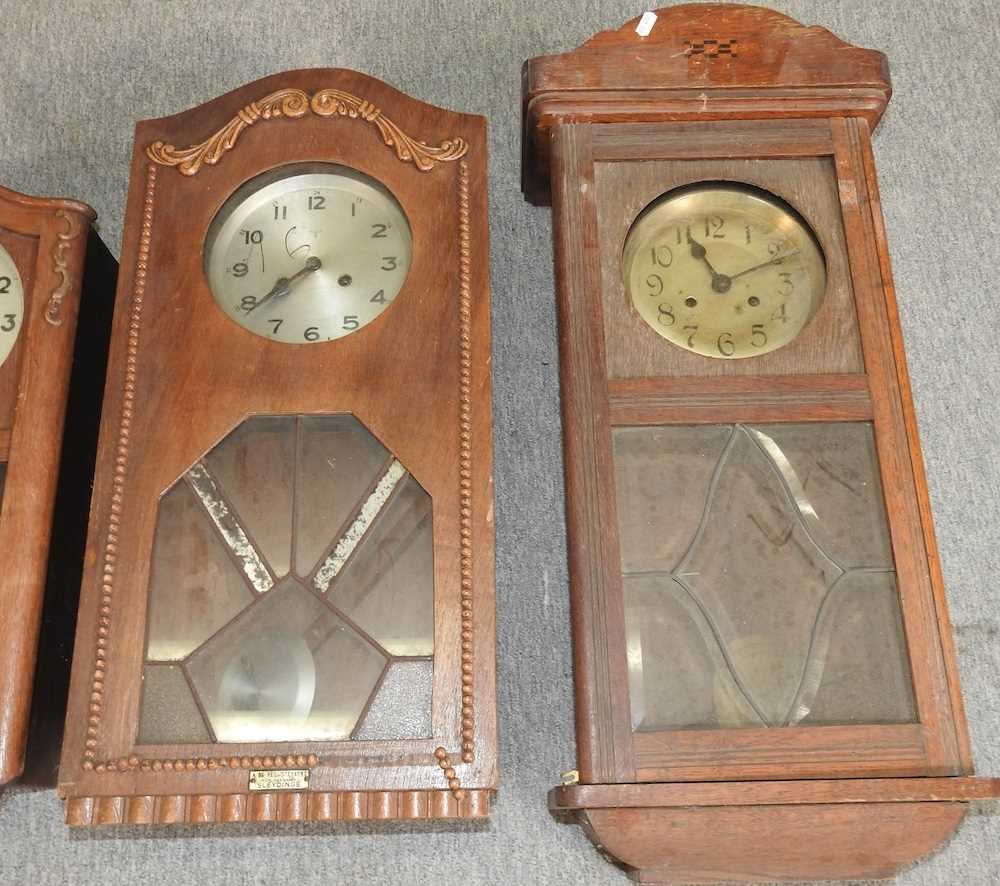 Lot 457 - A collection of four wall clocks